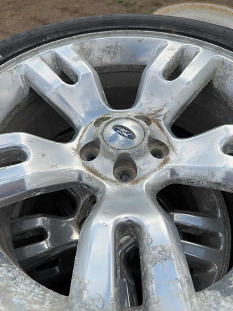 Set a four Hercules tires on Ford rims