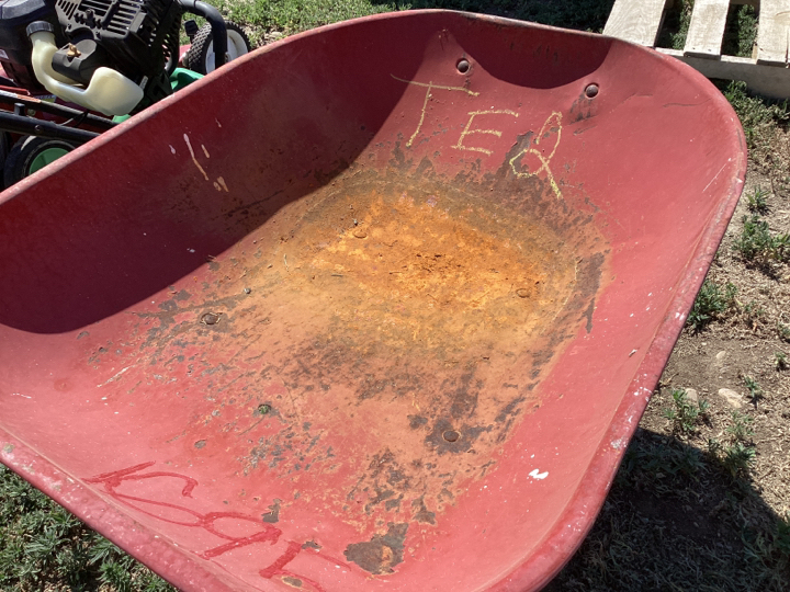 RED METAL WHEELBARROW